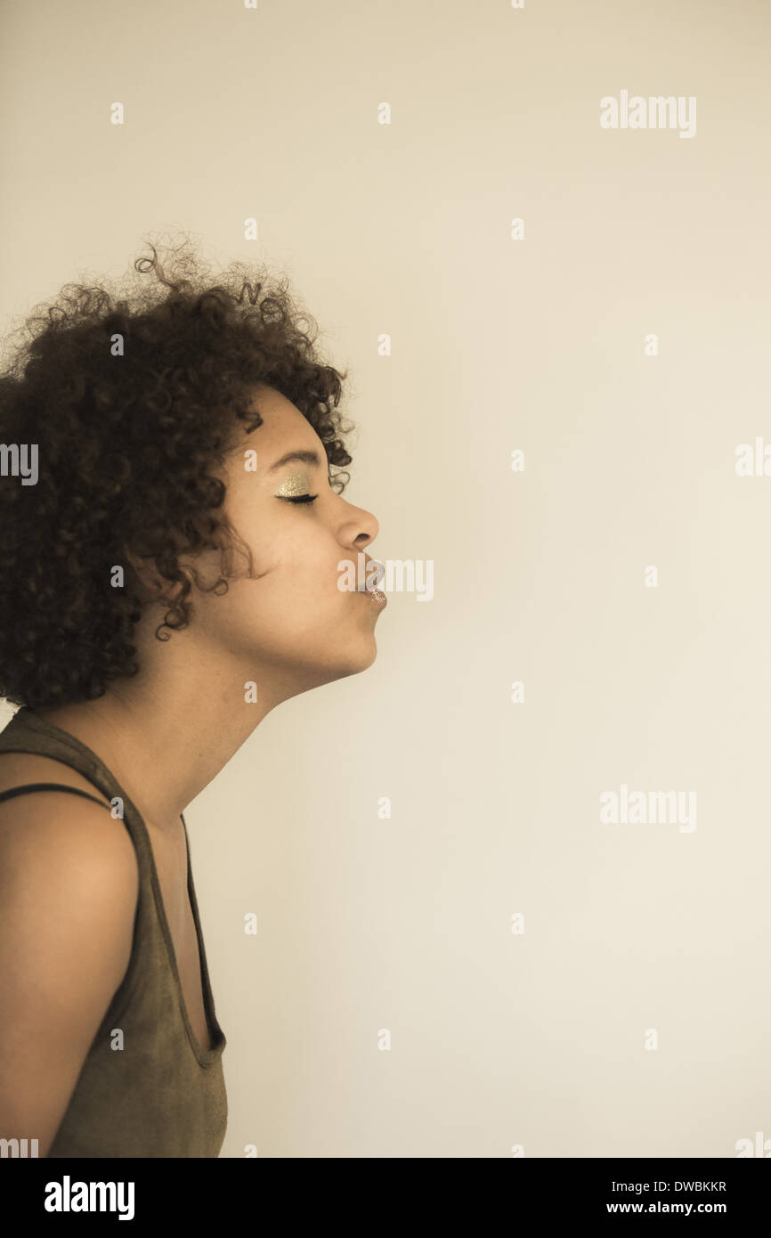 Portrait of female Afro-American pouting Stock Photo - Alamy