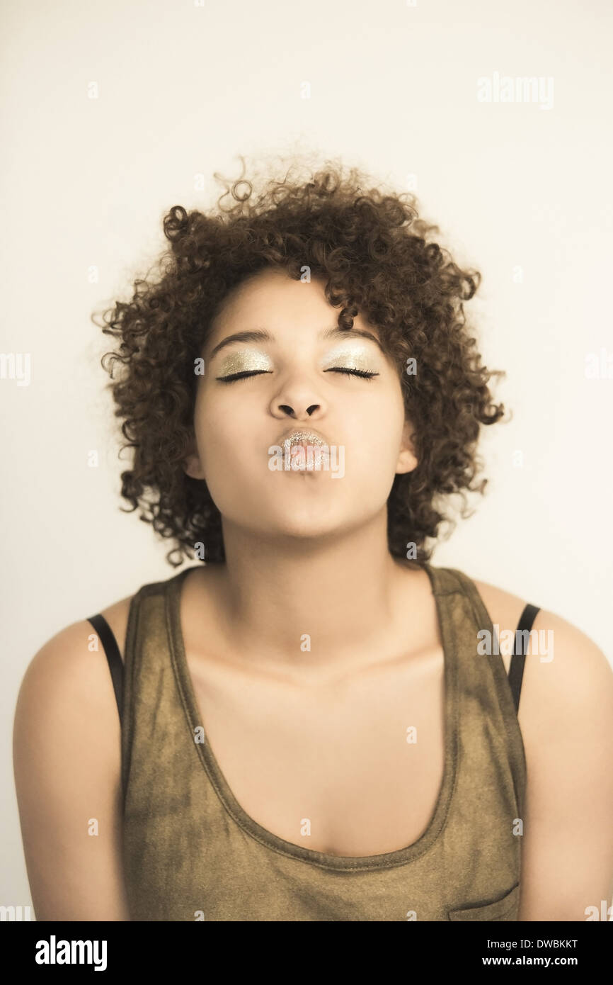 Portrait of female Afro-American pouting Stock Photo - Alamy