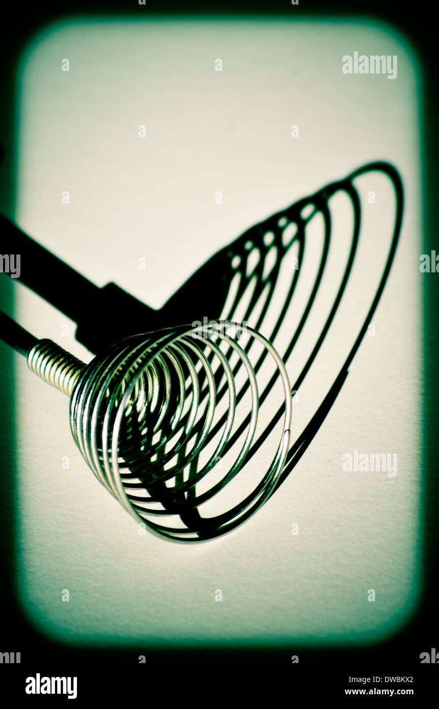 Metal spiral whisk, detail Stock Photo - Alamy