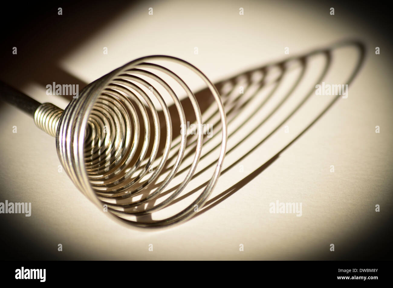 Metal spiral whisk, detail Stock Photo - Alamy