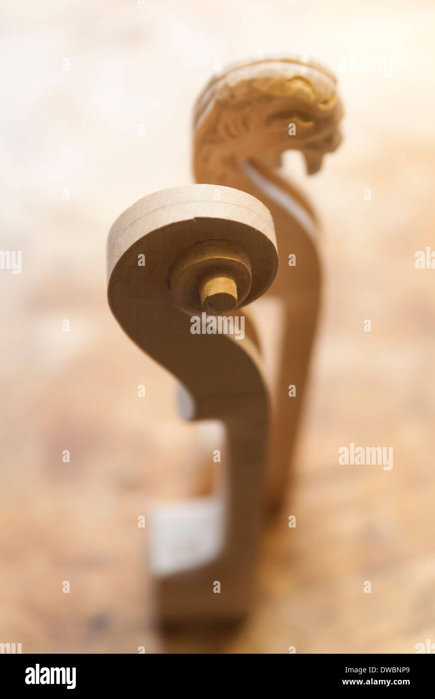 Scroll of a violin in a violin maker's workshop Stock Photo - Alamy