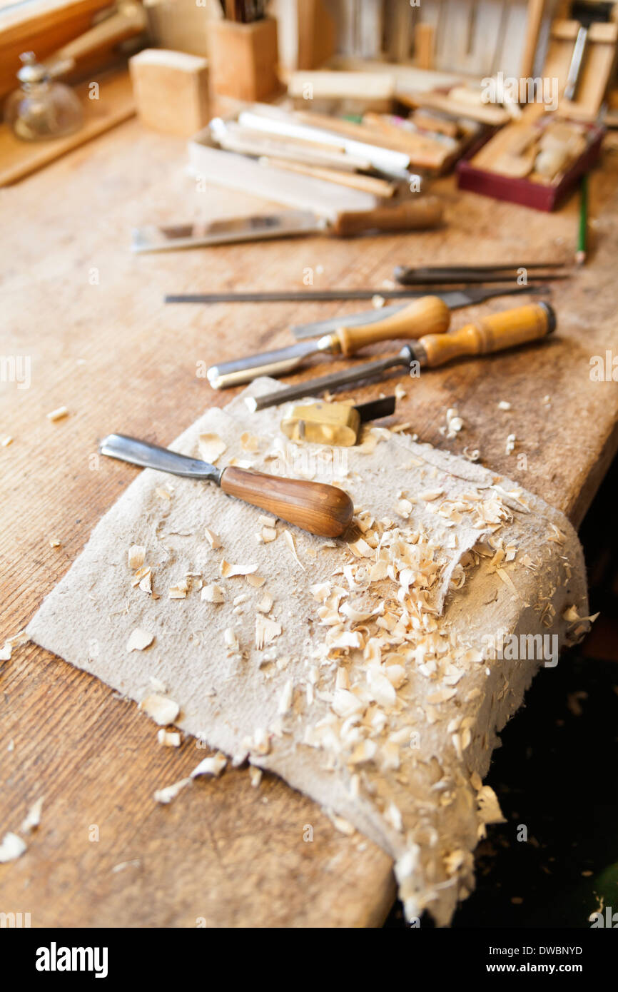 Work bench in a violin maker's workshop Stock Photo - Alamy