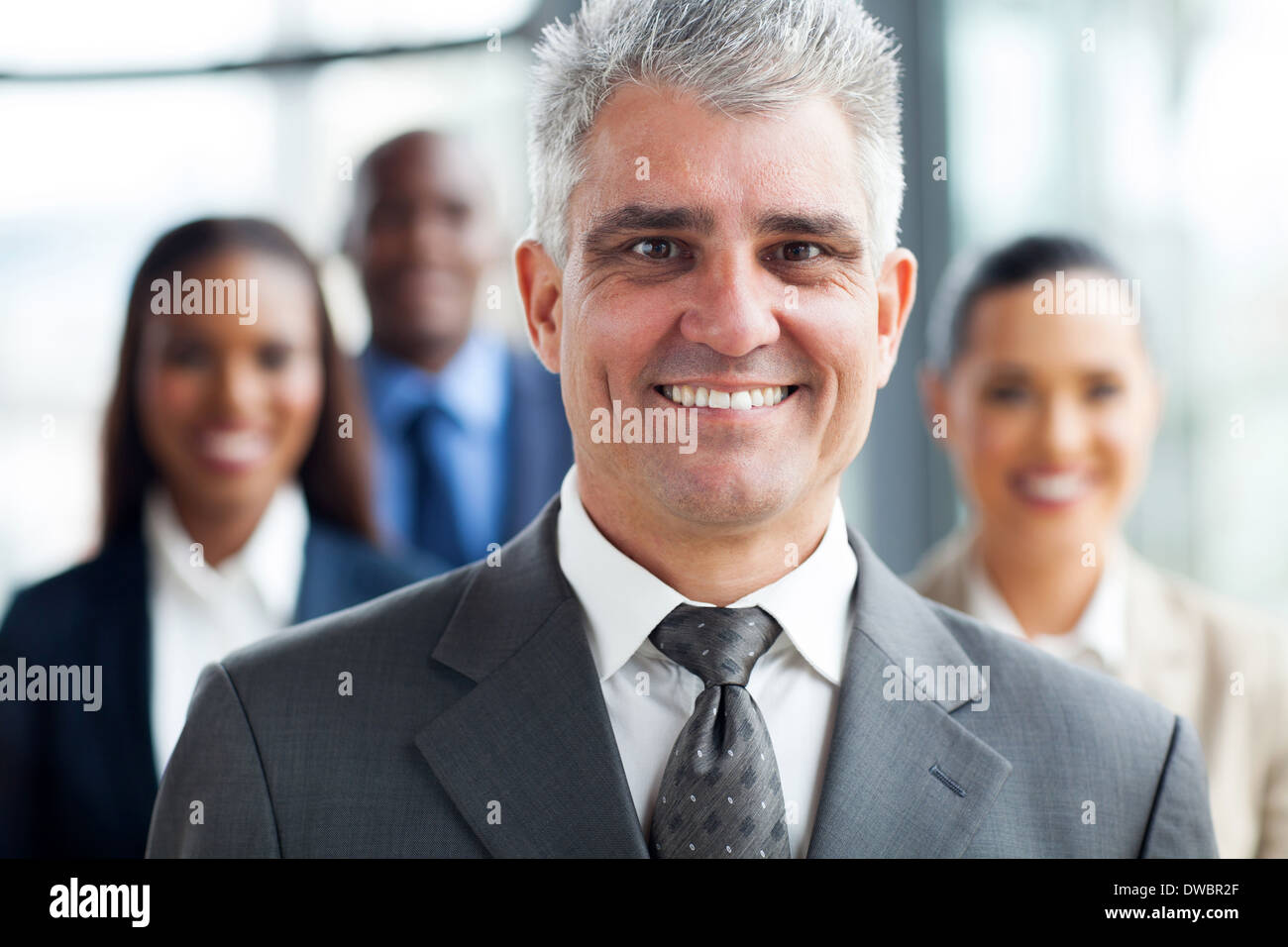 Grey hair workers group hi-res stock photography and images - Alamy