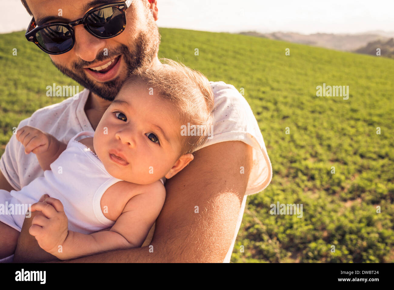 Portrait of baby girl and proud father Stock Photo - Alamy