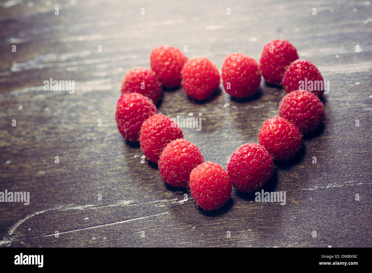 Heart formed of raspberries hi-res stock photography and images - Alamy
