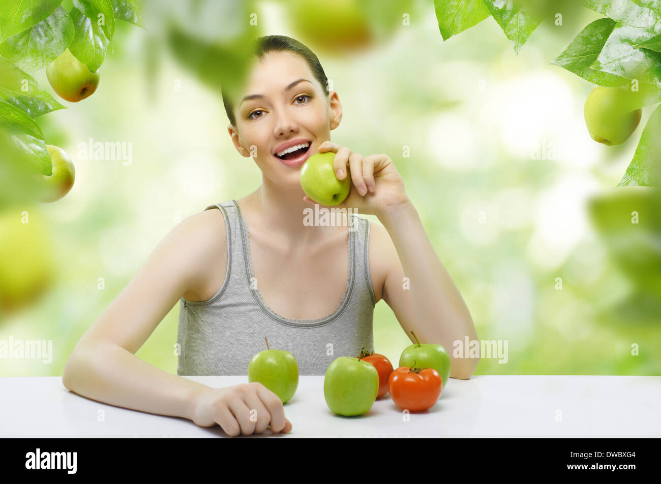 A beautiful slender girl eating healthy food Stock Photo - Alamy