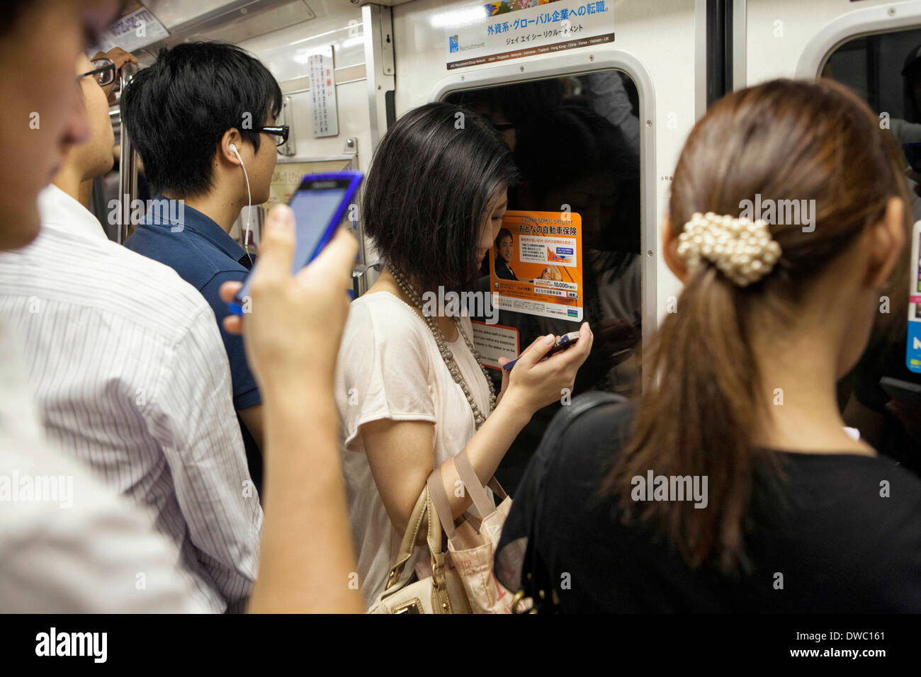 Phone in subway hi-res stock photography and images - Alamy