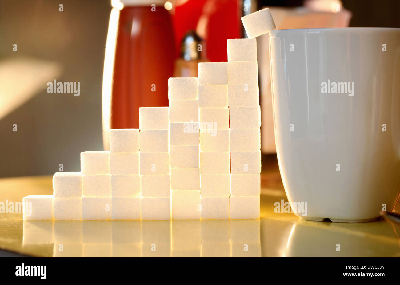 Sugar lumps stacked in shape of graph Stock Photo - Alamy