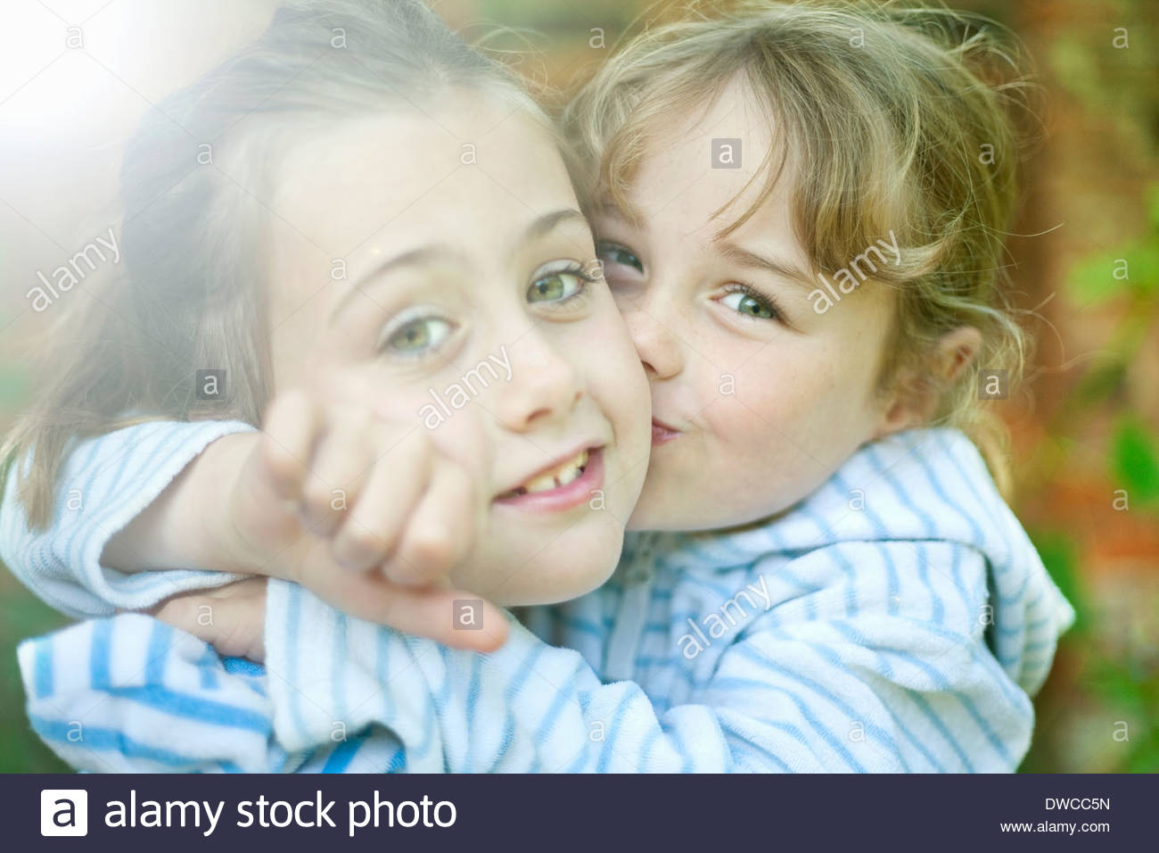 Sisters hugging Stock Photo, Royalty Free Image: 67270497 - Alamy