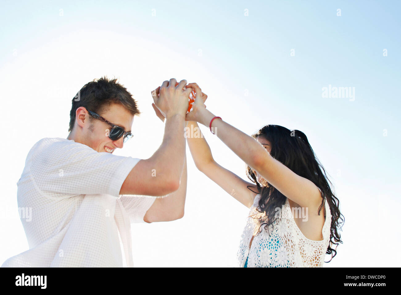 Woman raised two hands hi-res stock photography and images - Alamy