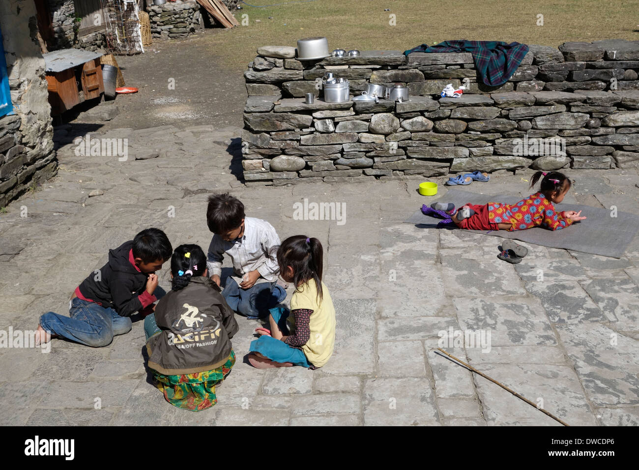 Nepalese children playing a game in the village of Jagat, Manaslu ...