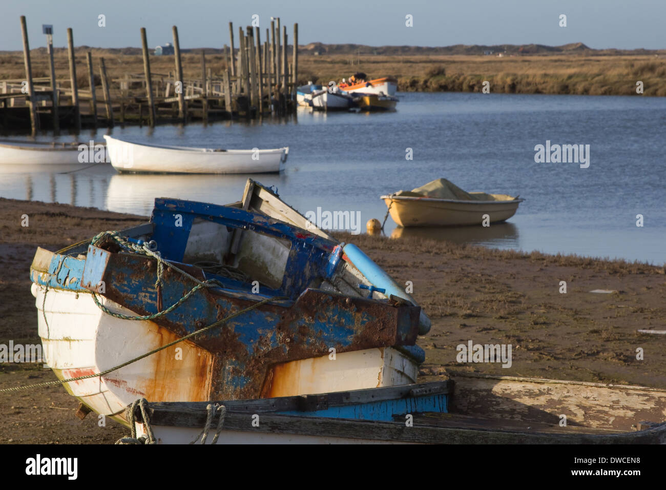 Morston quay and creeks and boats mooring Stock Photo - Alamy