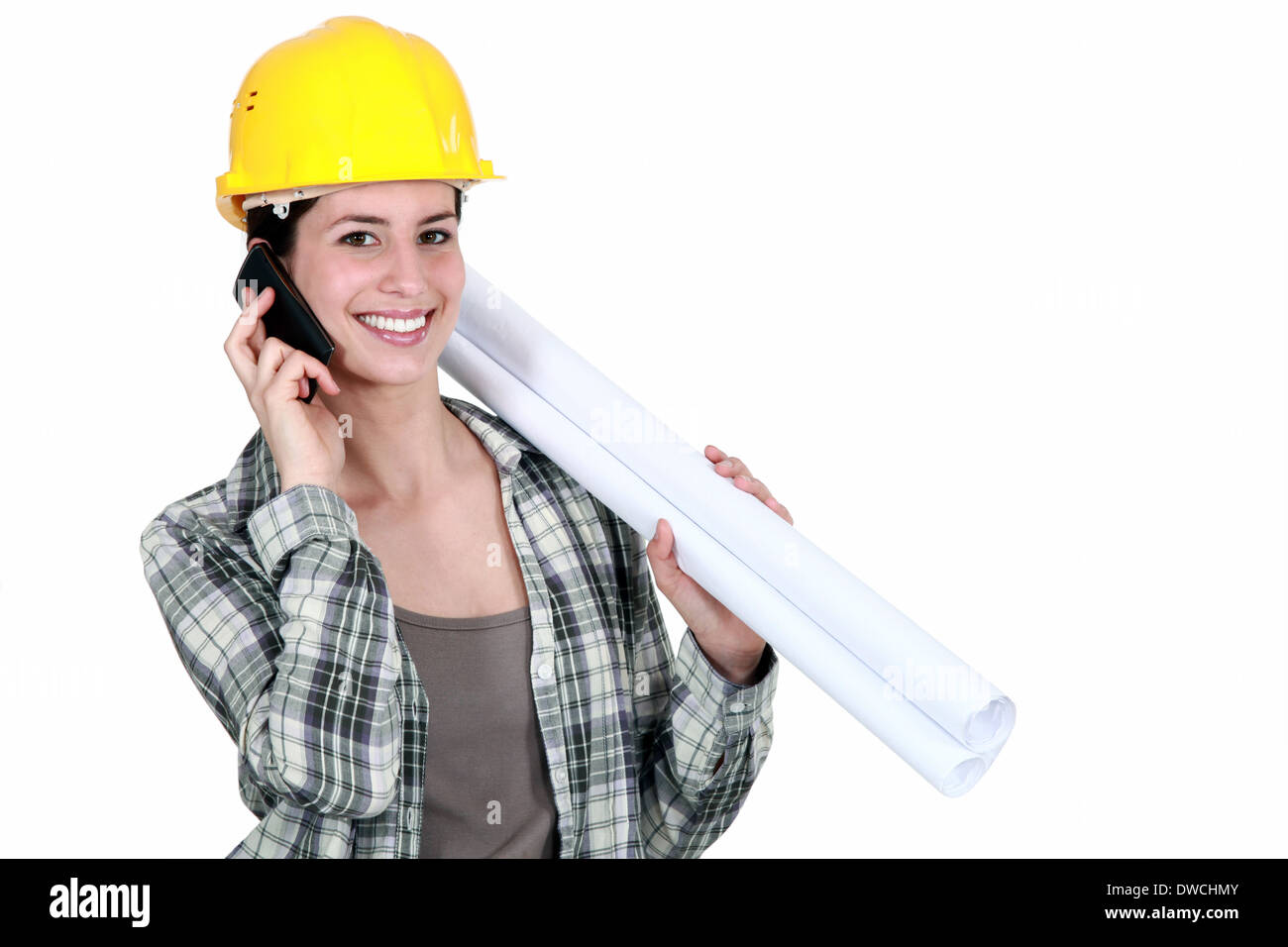 Female builder with plans Stock Photo - Alamy