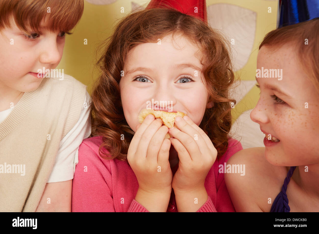 Covering mouth while eating hi-res stock photography and images - Alamy
