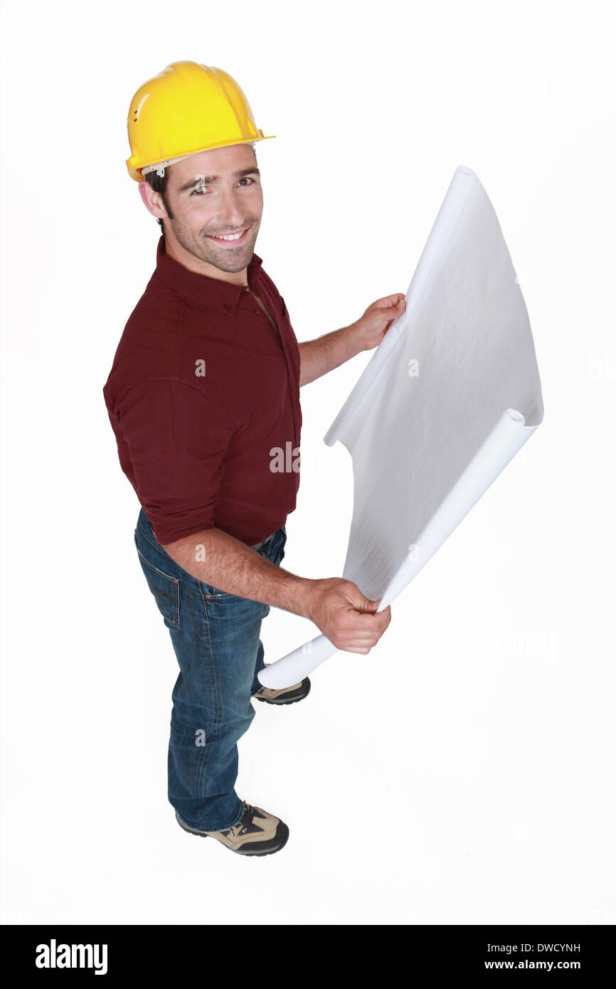 Construction worker with map in hand Stock Photo - Alamy