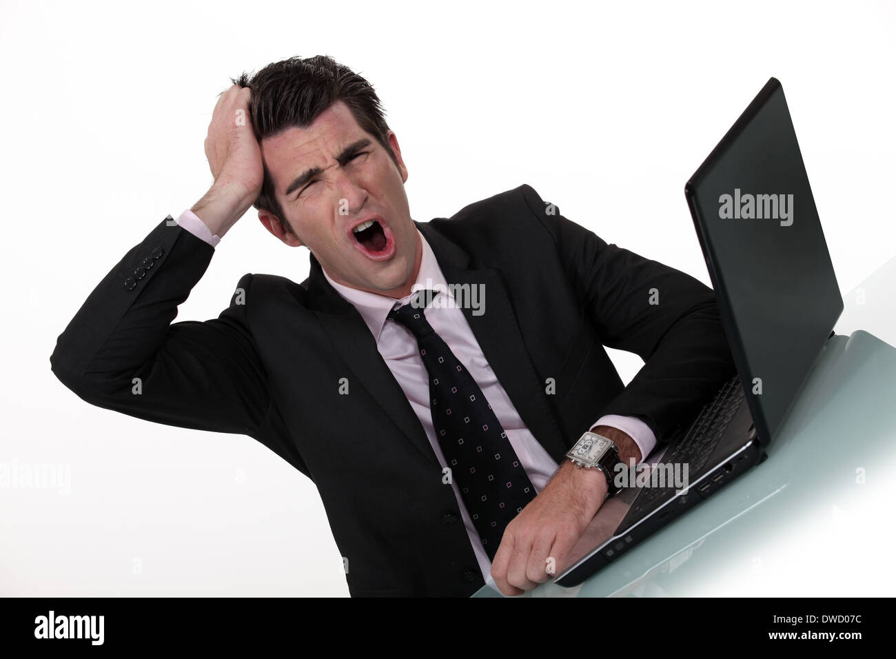 Man pulling his hair Stock Photo - Alamy