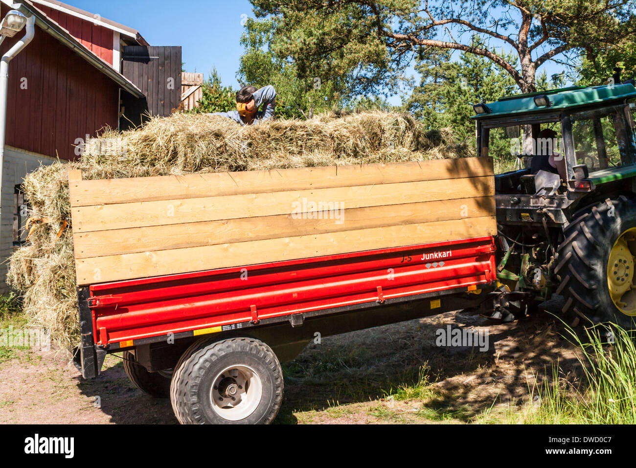Tractor pulling trailer hi-res stock photography and images - Alamy