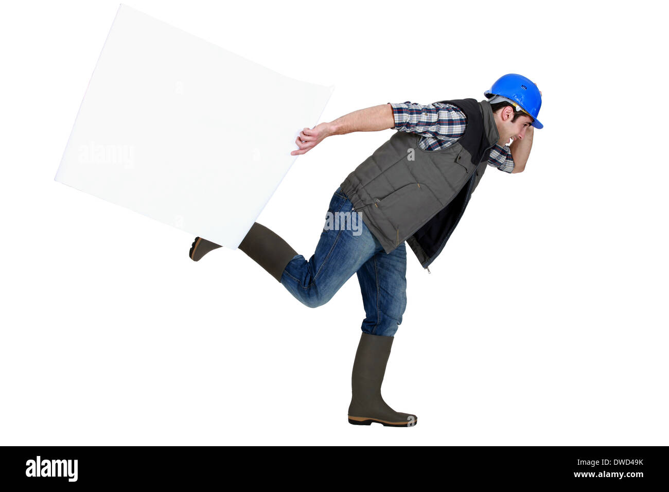Builder running with blank poster Stock Photo - Alamy