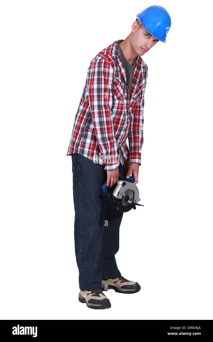 Man holding circular saw Stock Photo - Alamy