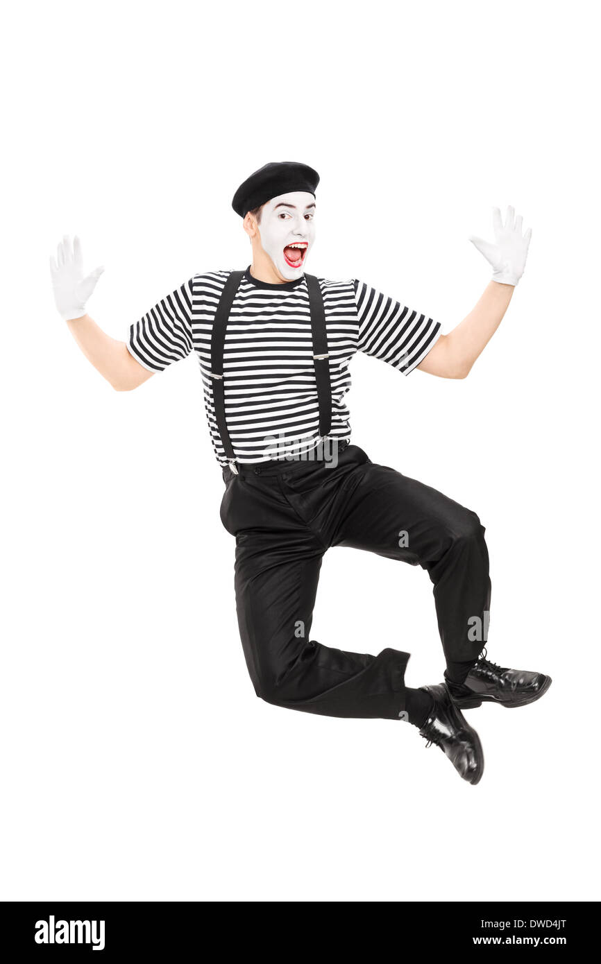 Full length portrait of mime artist jumping with joy Stock Photo - Alamy