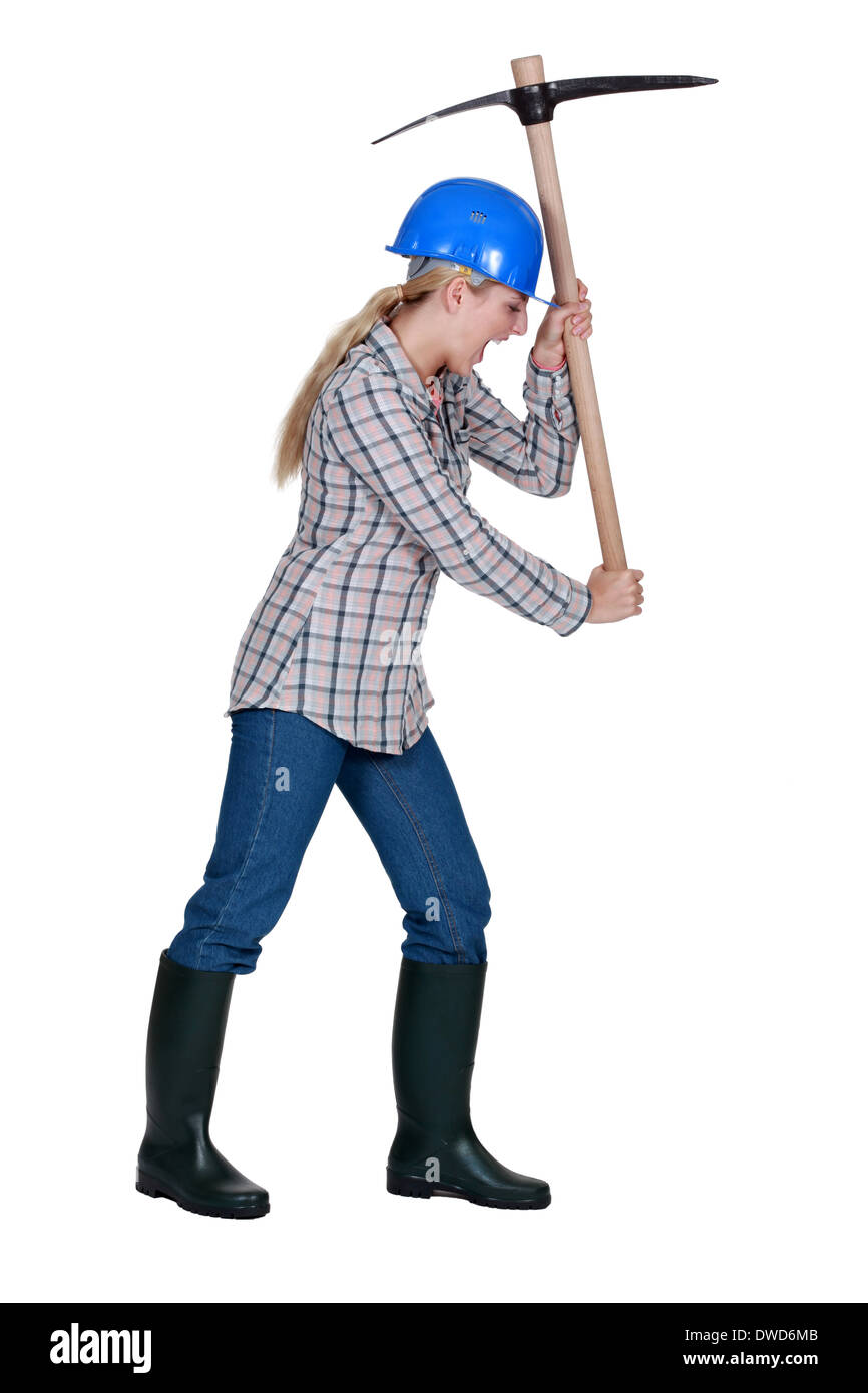 Woman with a pickaxe Stock Photo - Alamy