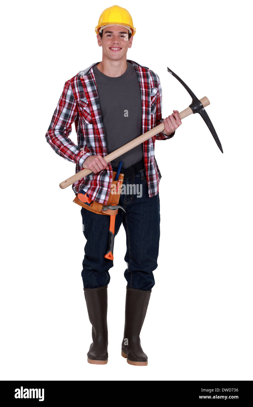 Smiling workman with pickaxe Stock Photo - Alamy