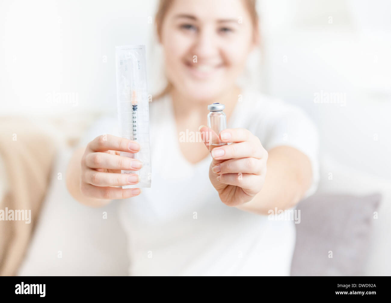 Woman holding insulin syringe Stock Photo - Alamy