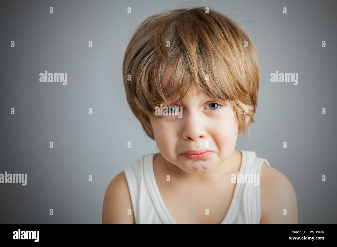Sad Young Boy Stock Photo - Alamy