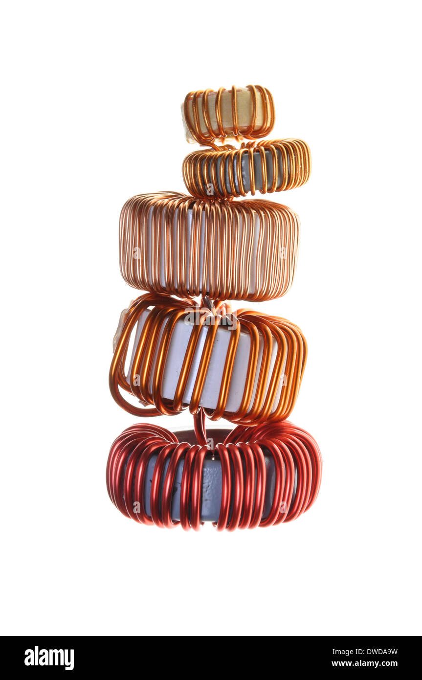 Copper coils isolated on white background Stock Photo - Alamy