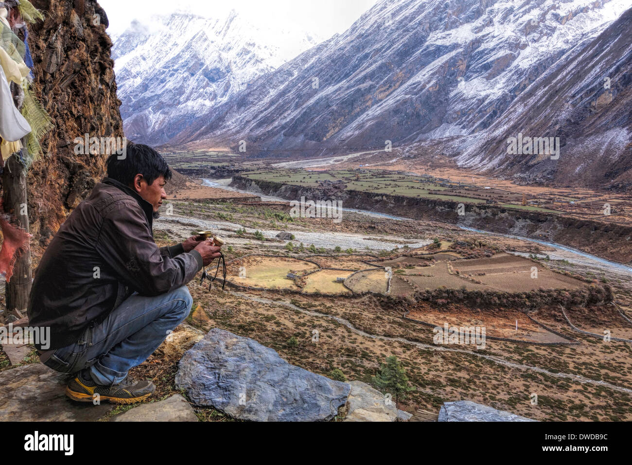 Caretaker of Milarepa Cave, a historic Bhuddist site in the Tsum Valley ...