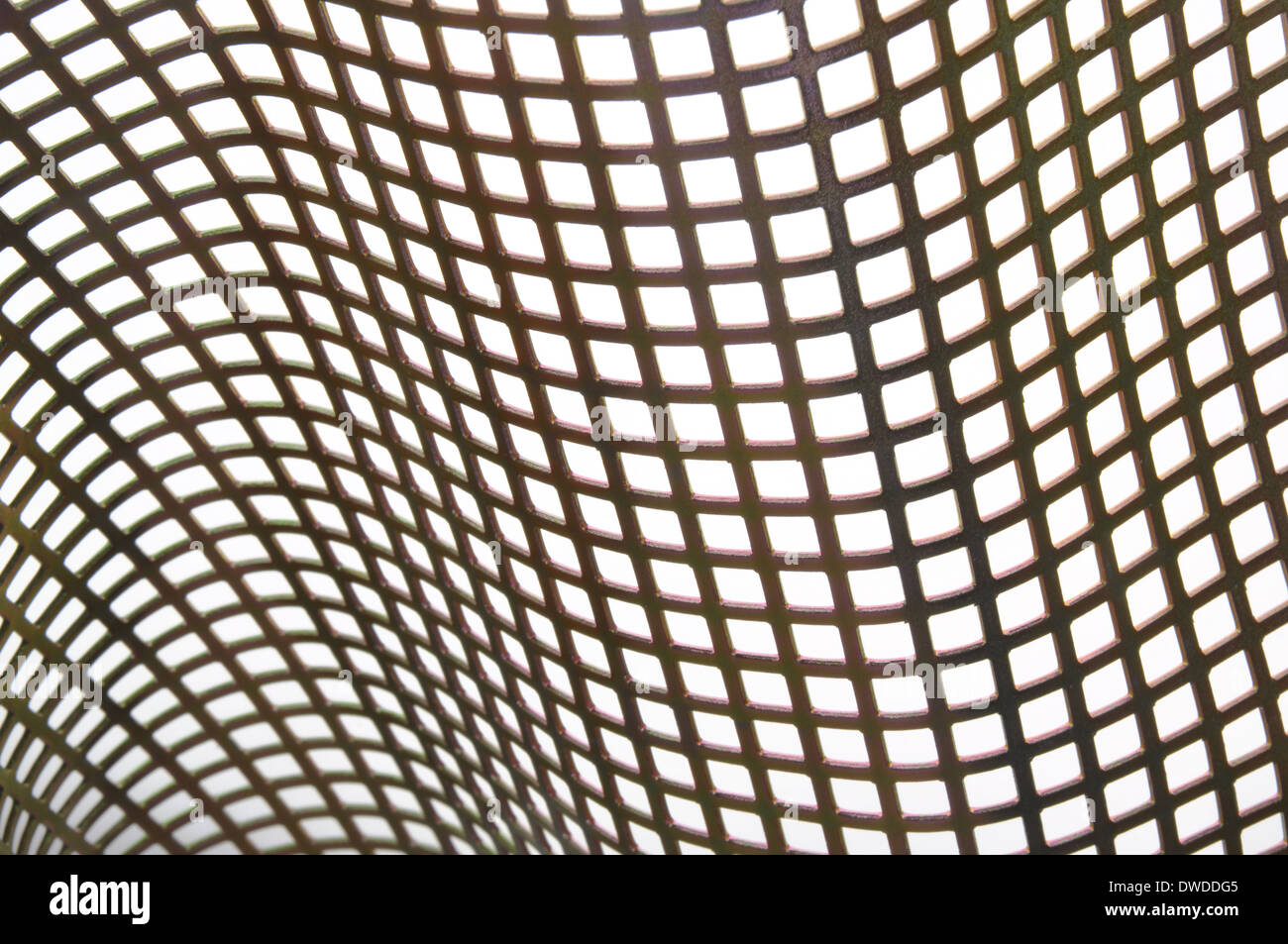 Shiny metal surface background with square holes Stock Photo - Alamy