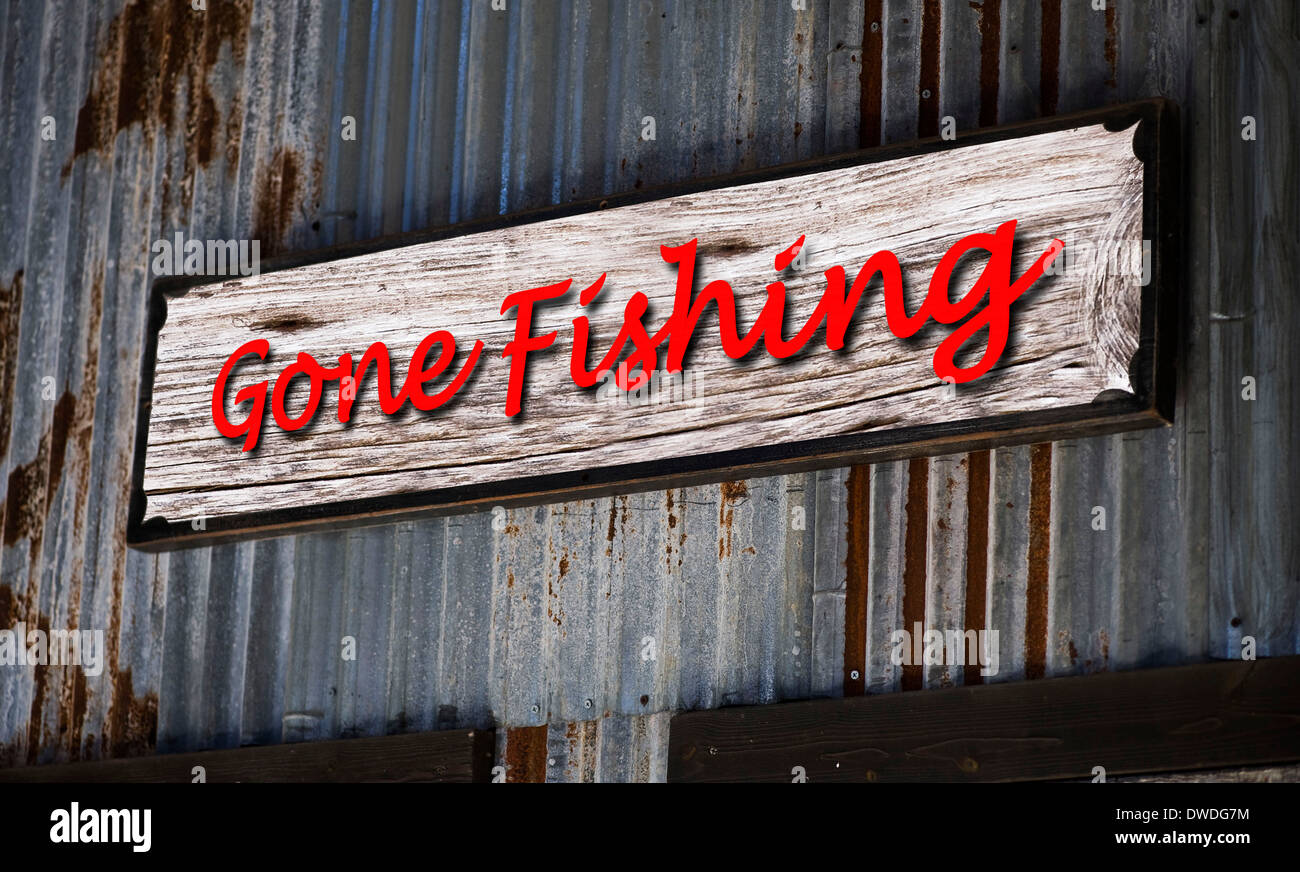 Old gone fishing sign Stock Photo - Alamy