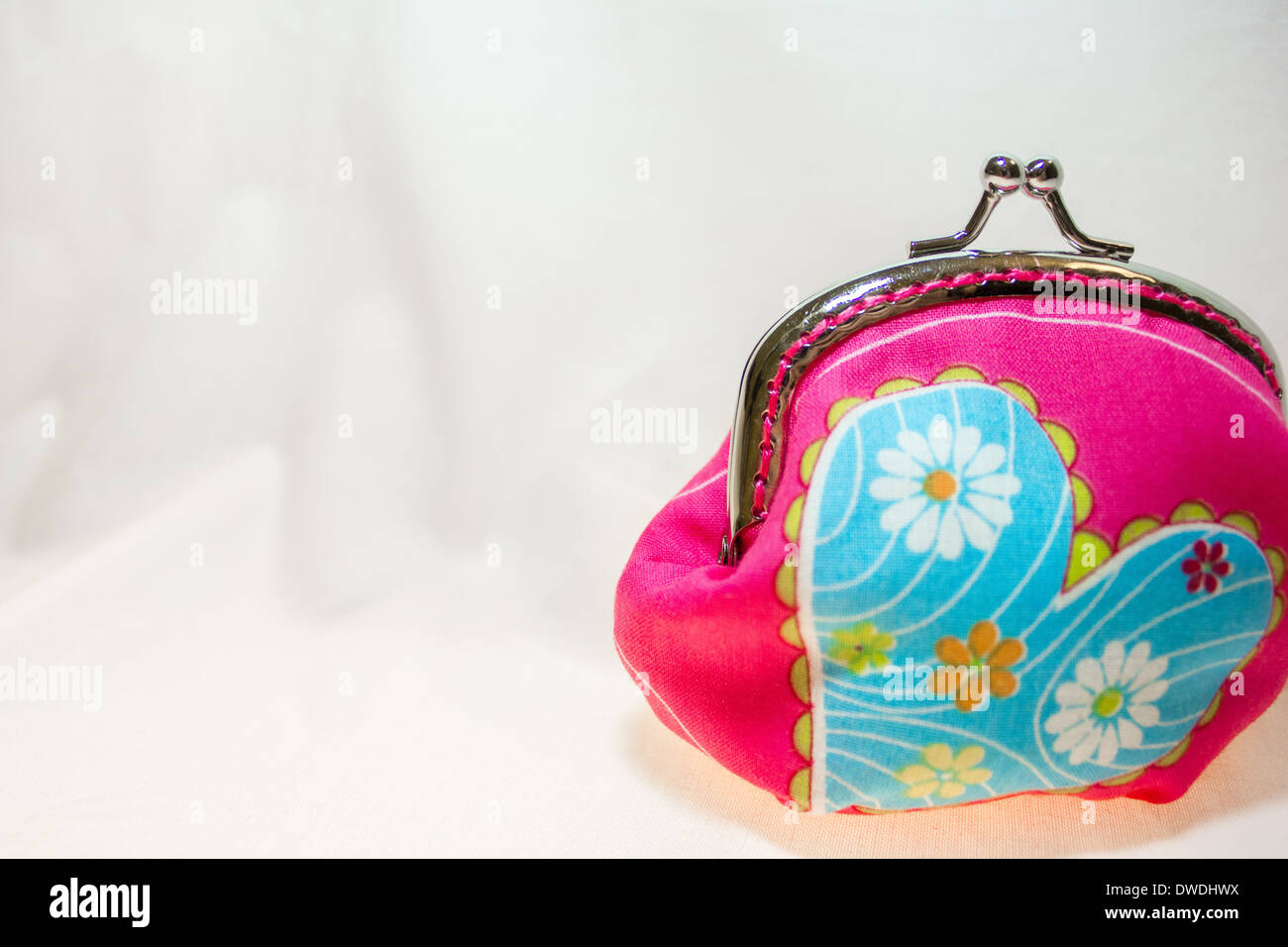 Small woman purse with withe background Stock Photo - Alamy