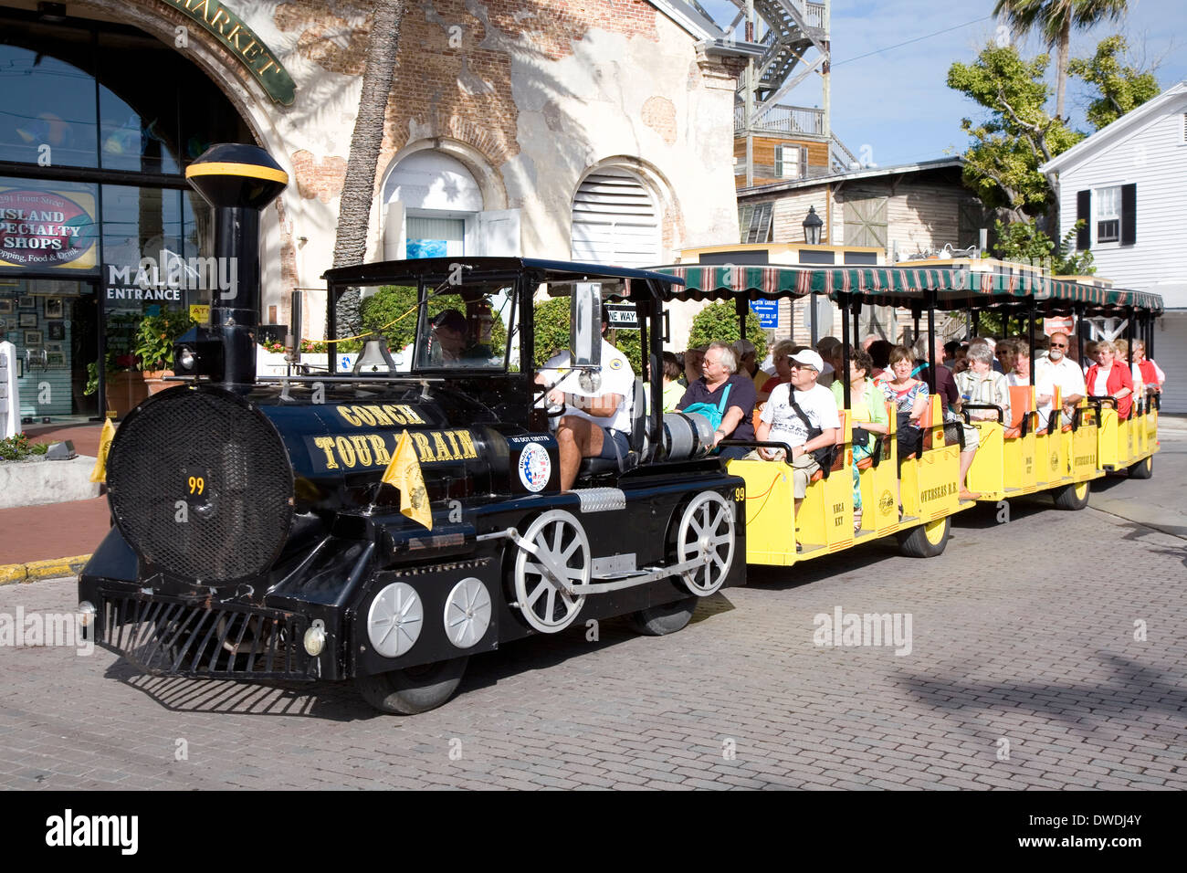 Visitors by the thousands climb aboard the Conch Tour Train daily for a ...