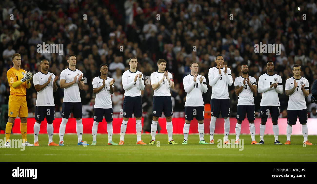 London, UK. 5th Mar, 2014. Players of England observe a minutes ...