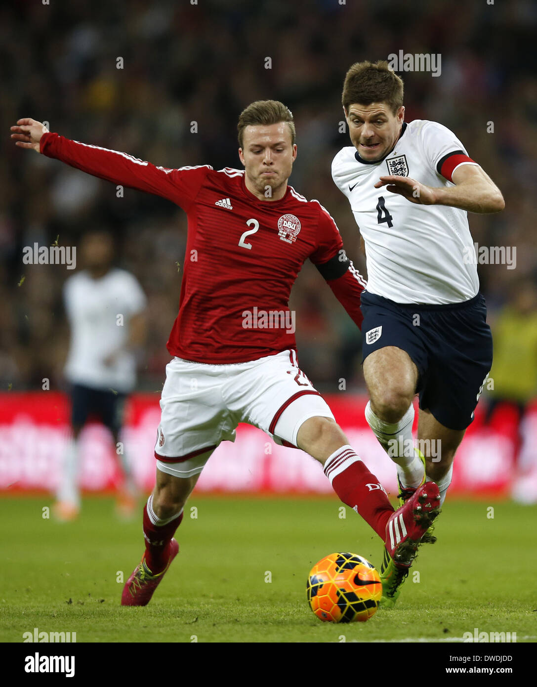 London, UK. 5th Mar, 2014. Steven Gerrard(R) of England vies with ...