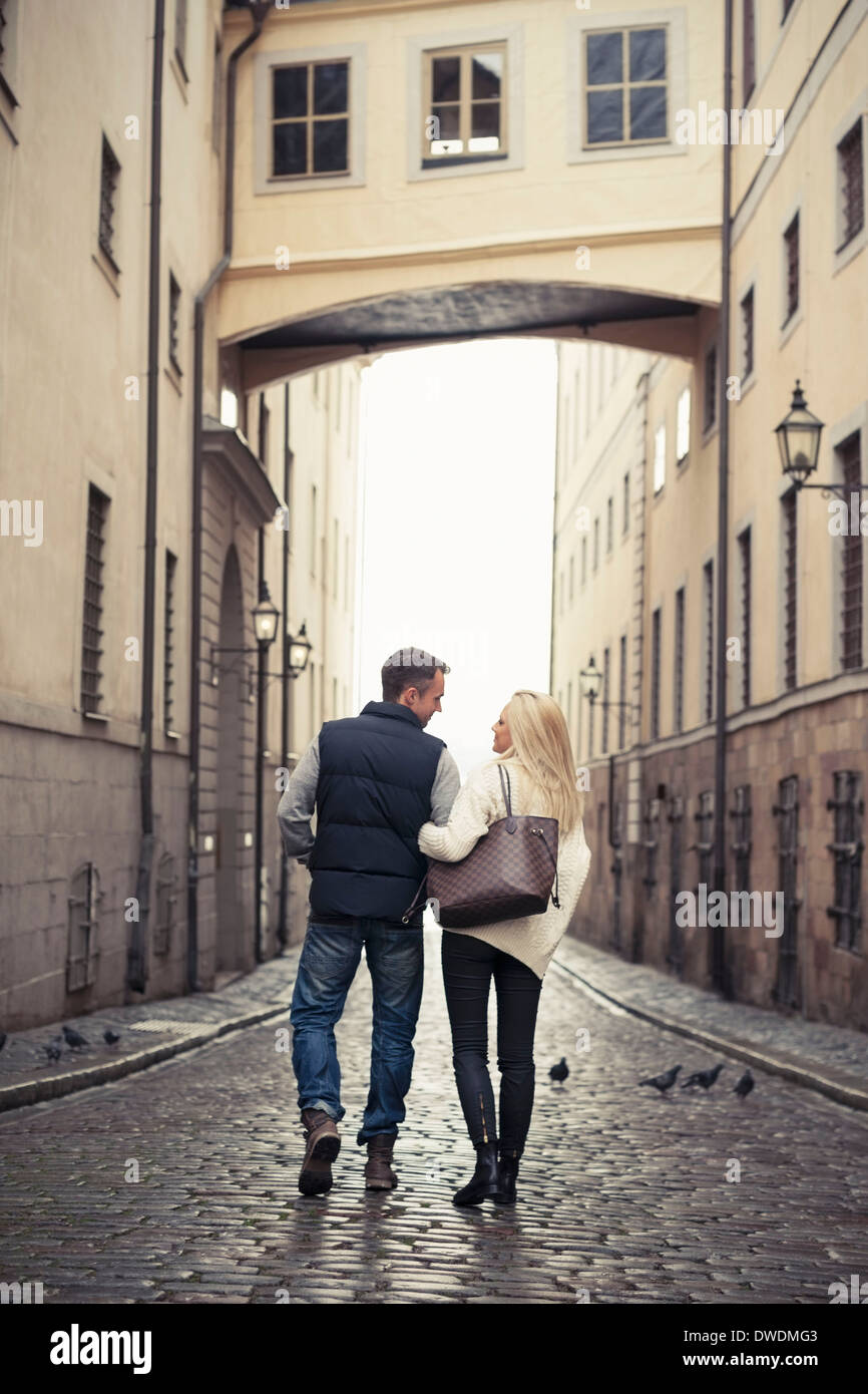 Rear view romantic couple walking hi-res stock photography and images ...