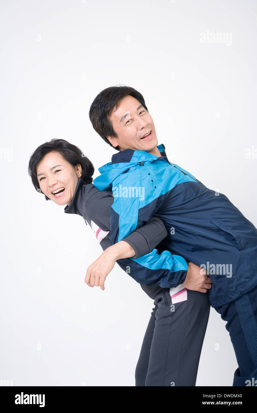 Linking arms and couple hi-res stock photography and images - Alamy