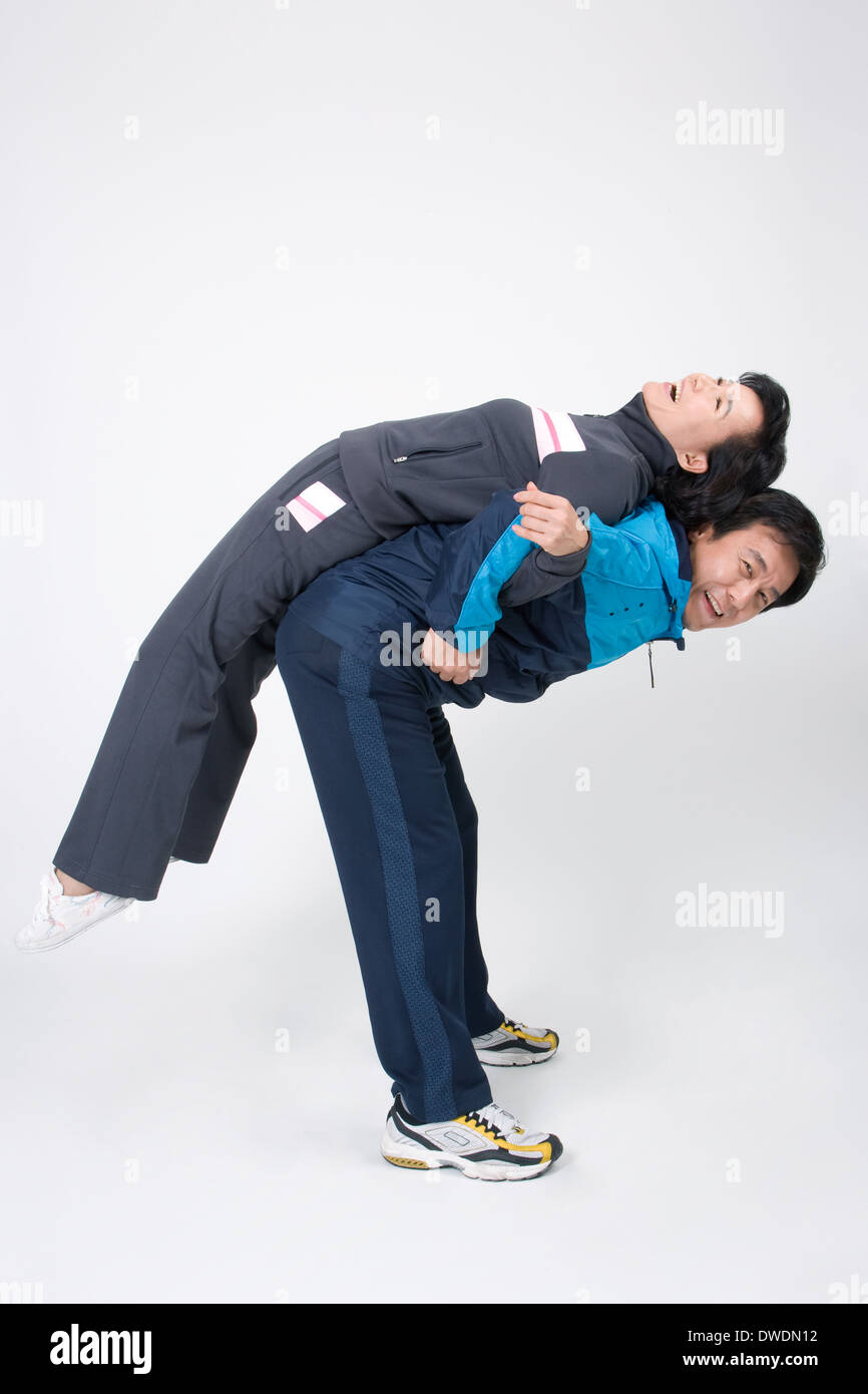 Linking arms and couple hi-res stock photography and images - Alamy