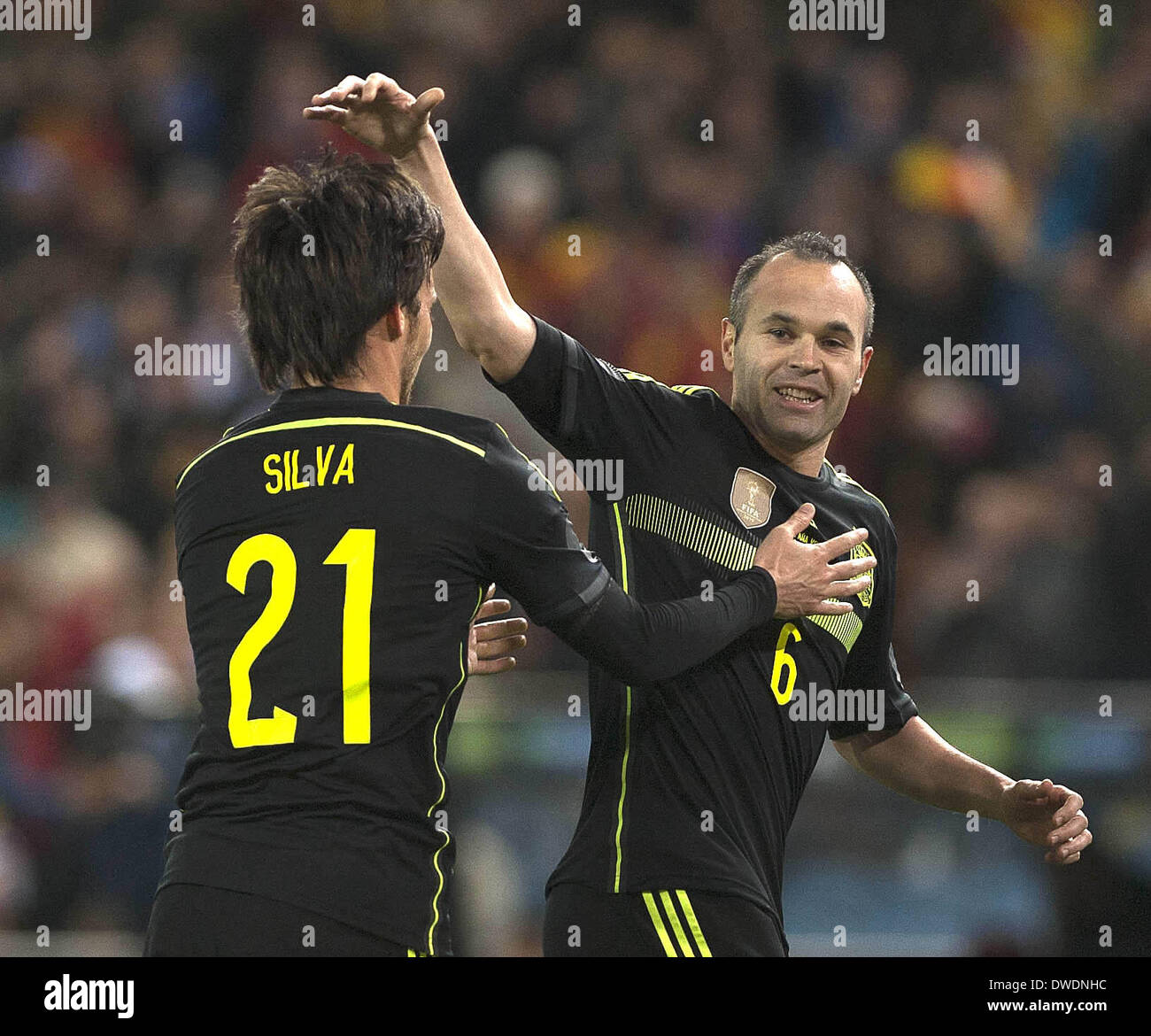 Madrid. 5th Mar, 2014. Andres Iniesta(R) and David Silva of Spain ...