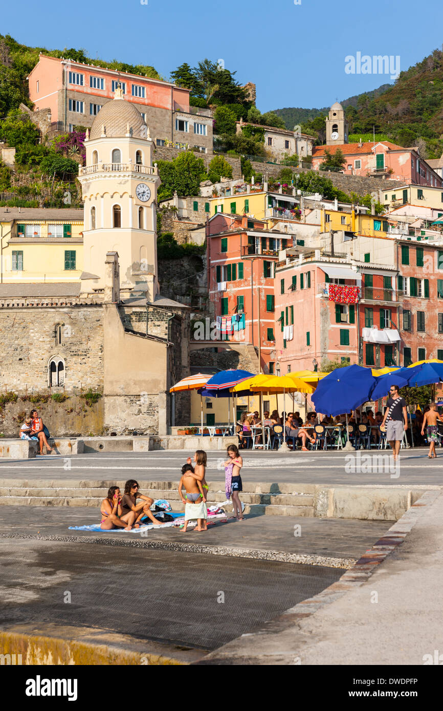 Italy, Liguria, Cinque Terre, People at te harbour of fishing village ...