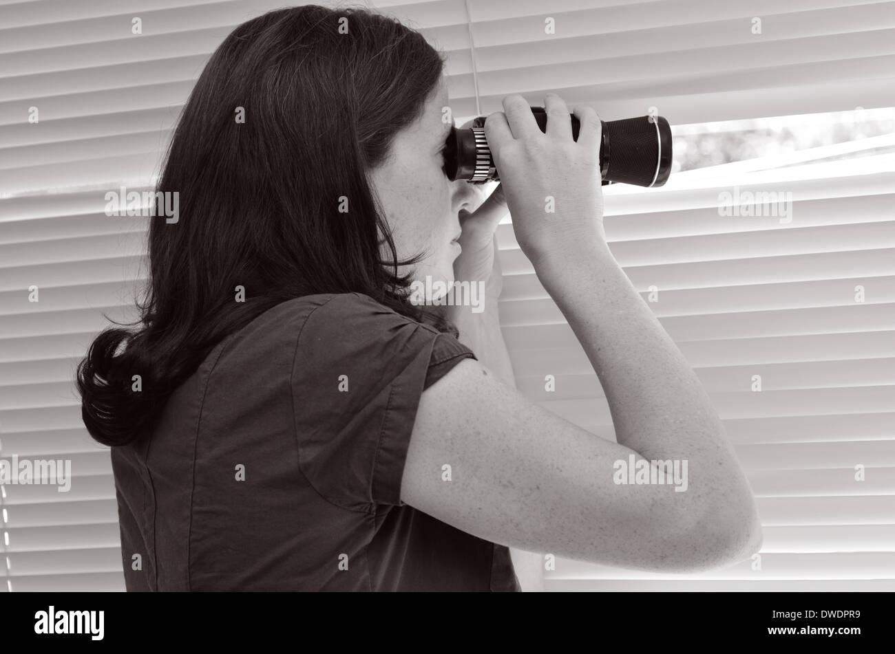 Woman Peeking Out Blinds High Resolution Stock Photography and Images ...