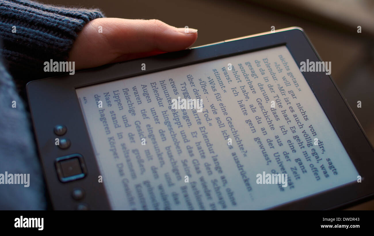 Little boy with eReader, studio shot Stock Photo - Alamy