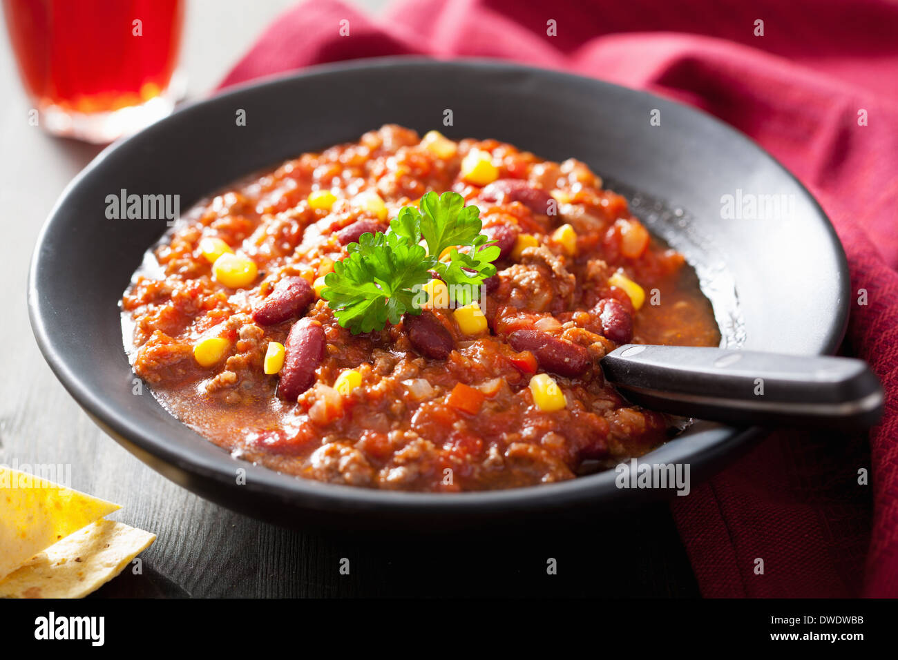 mexican chili con carne in black plate Stock Photo - Alamy