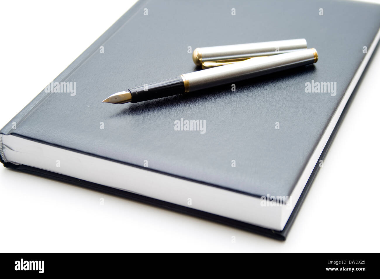 Writing pencils with notebook Stock Photo - Alamy