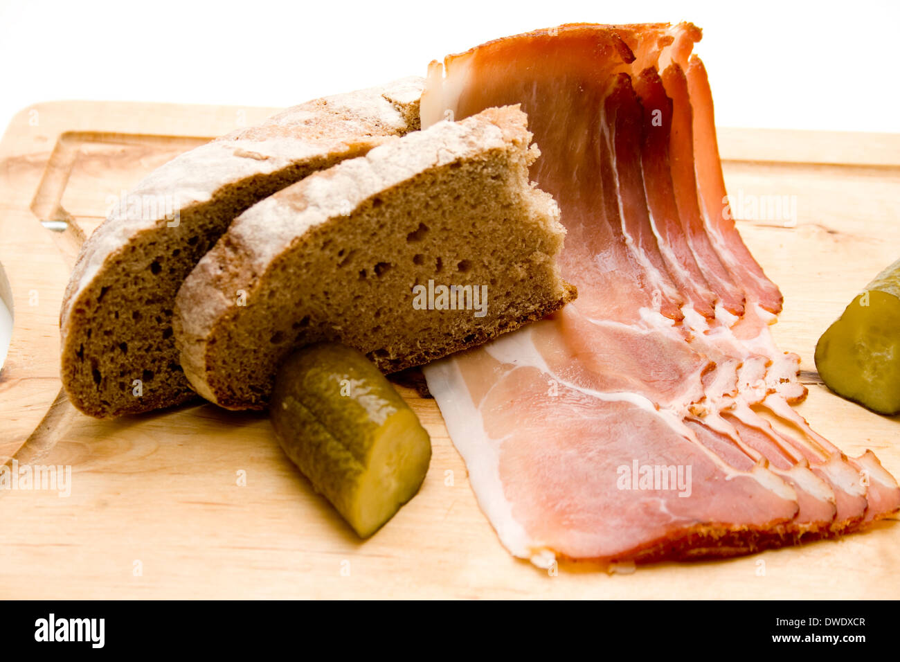 Farm ham with cucumbers Stock Photo - Alamy