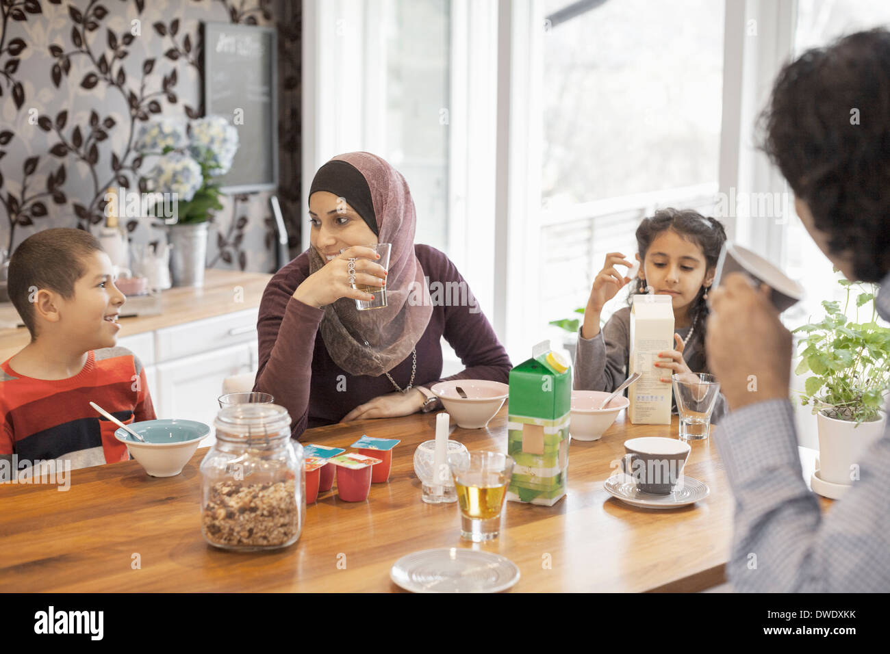 Muslim family having breakfast together at home Stock Photo - Alamy