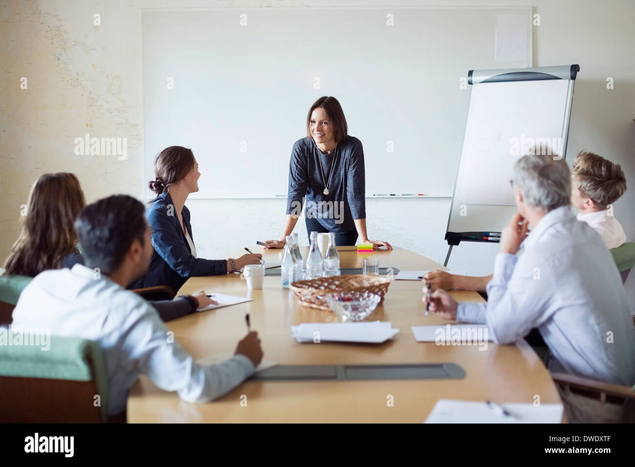 Group of business people discussing in board room Stock Photo - Alamy