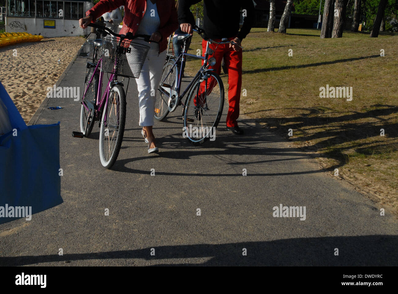 Woman rolling a bike hi-res stock photography and images - Alamy