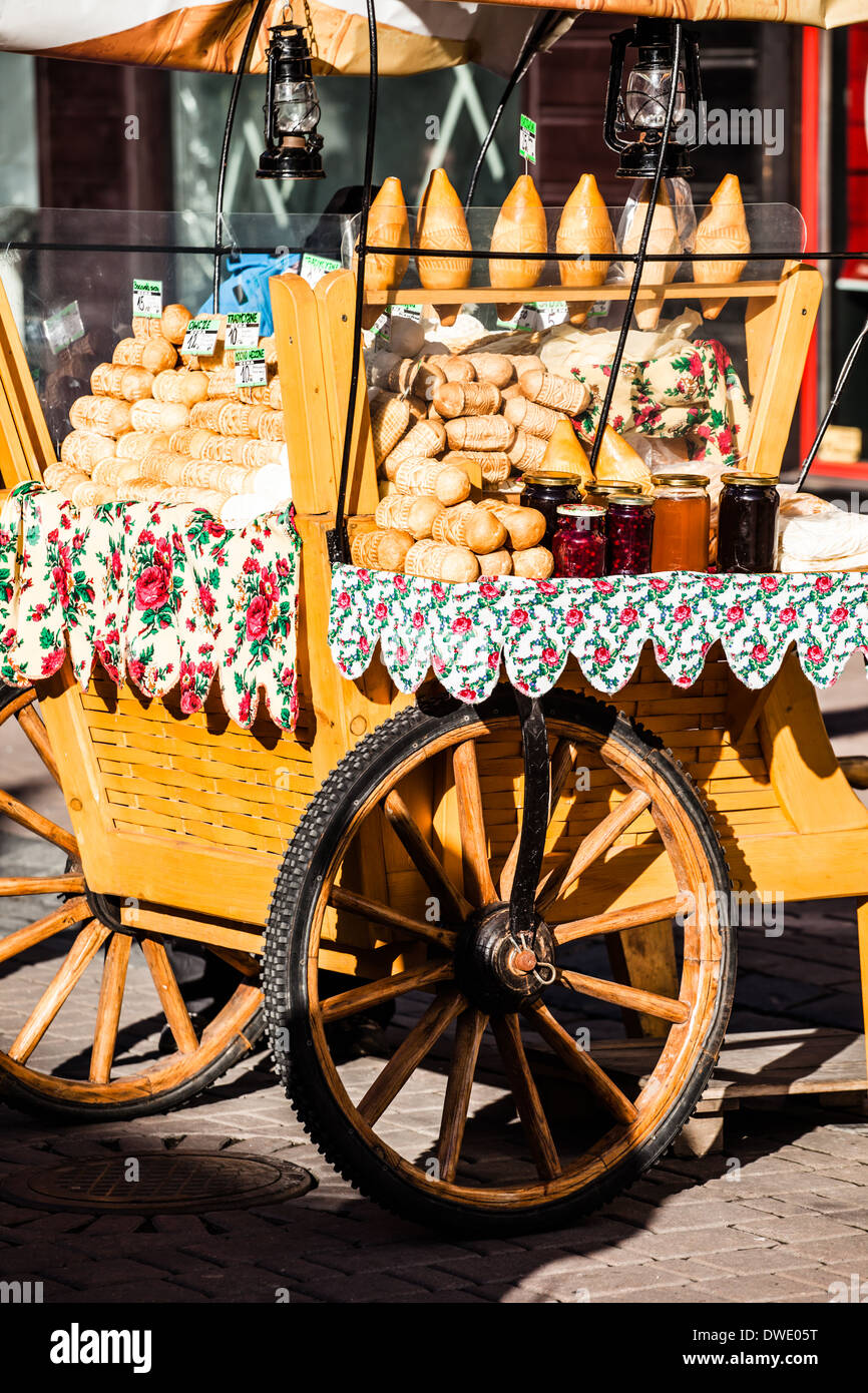 Traditional polish smoked cheese oscypek on outdoor market in Zakopane ...
